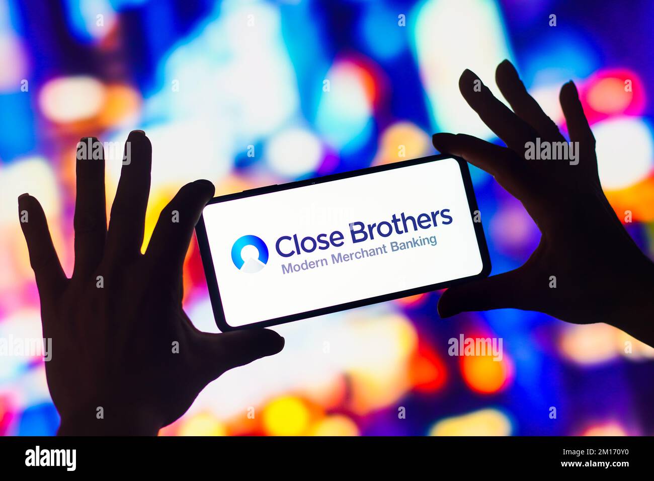 In this photo illustration, the Close Brothers Group logo is displayed ...