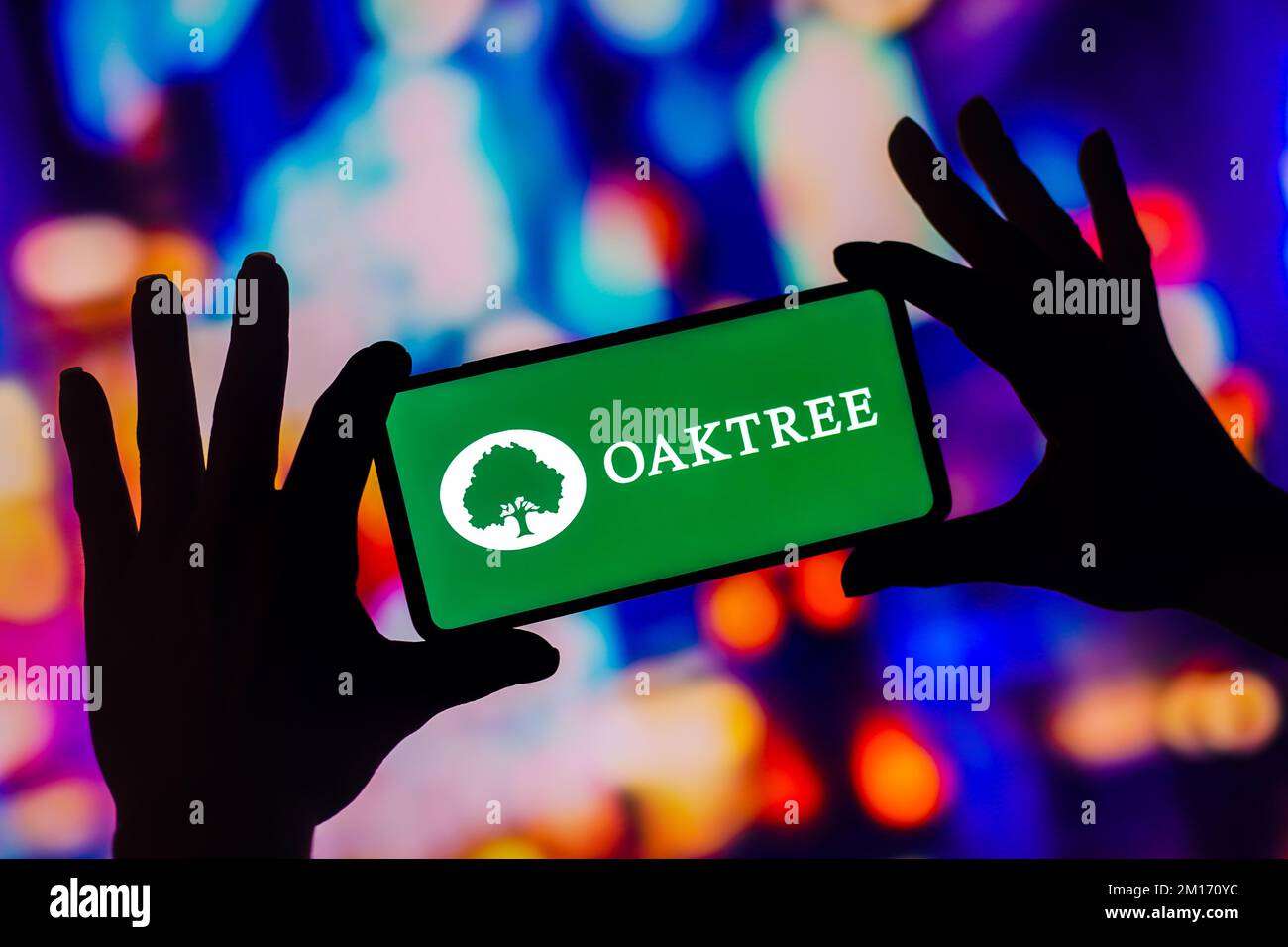 In this photo illustration, the Oaktree Capital Management logo is ...