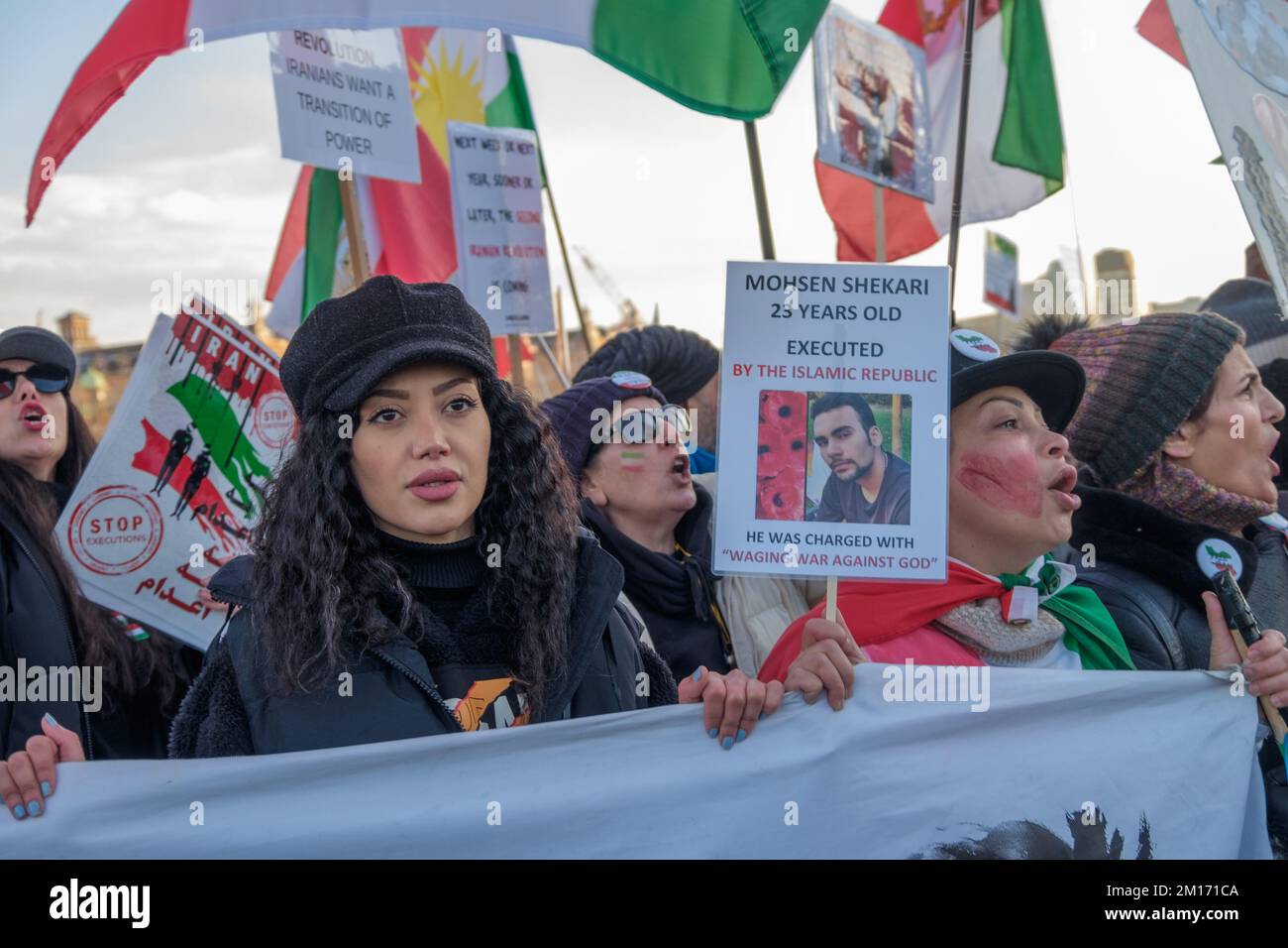 London, UK. 10 Dec 2022. Iranians and supporters march through London ...