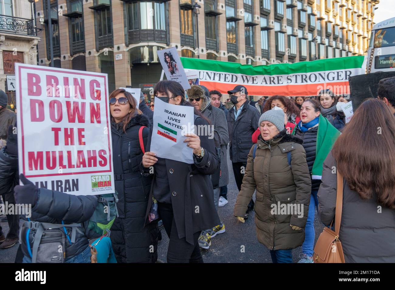London, UK. 10 Dec 2022. Iranians and supporters march through London ...