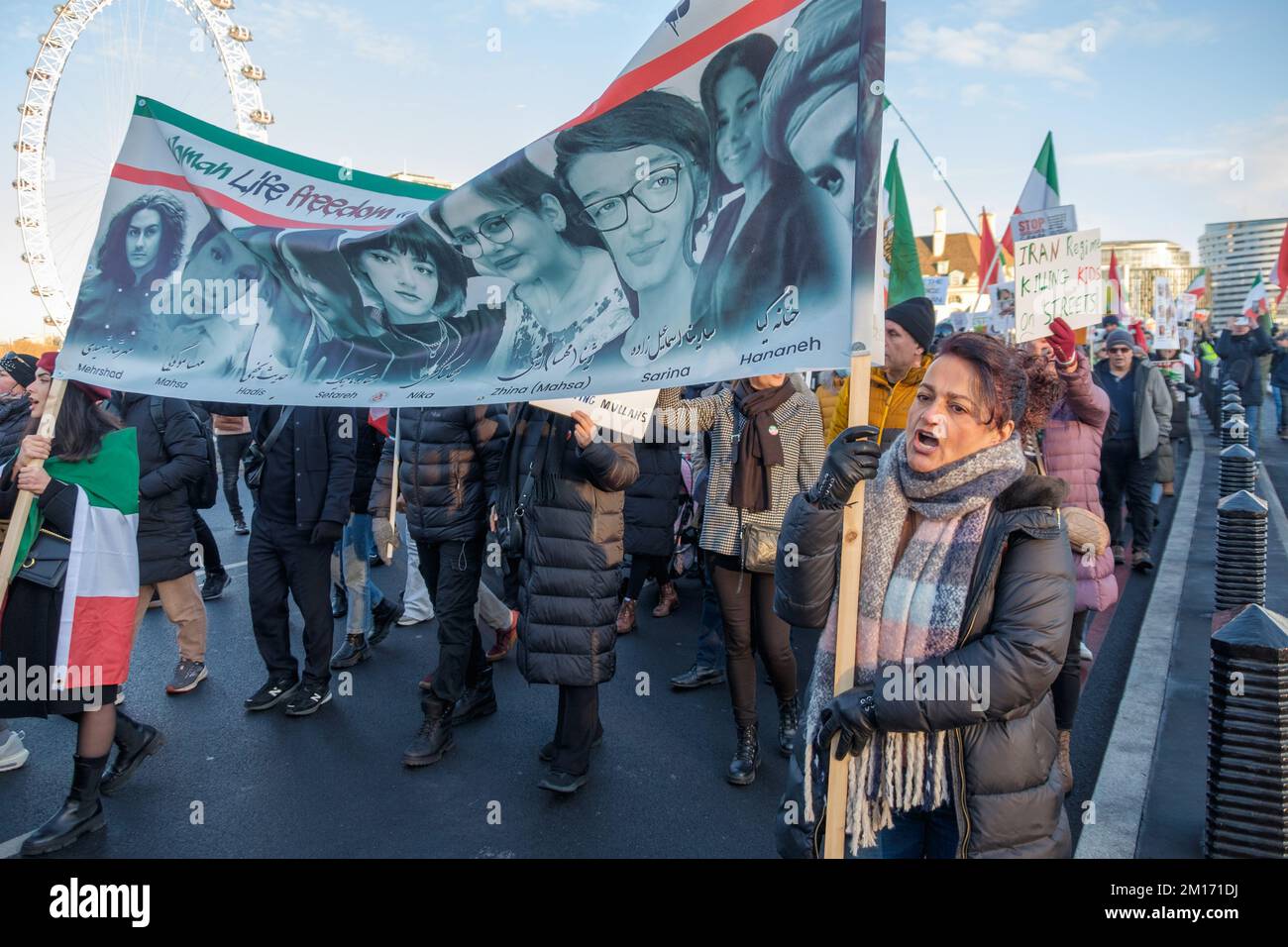 London, UK. 10 Dec 2022. Iranians and supporters march through London ...