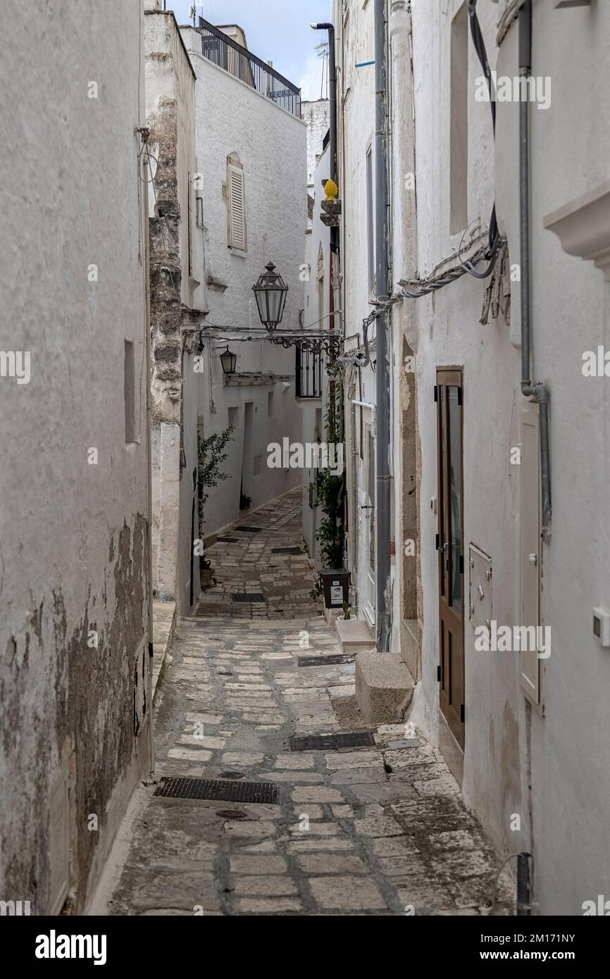 OSTUNI, ITALY - OCTOBER 18, 2022: View along narrow street in the old ...