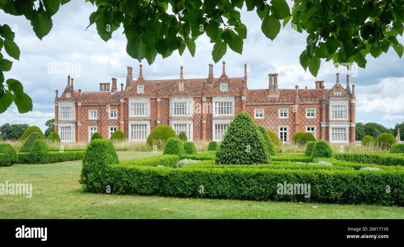 Helmingham Hall and Gardens Landscape view in summer from under foliage ...
