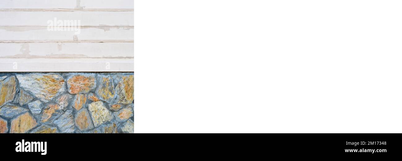 There is white painted wood paneling on the blue yellow ashlar wall ...