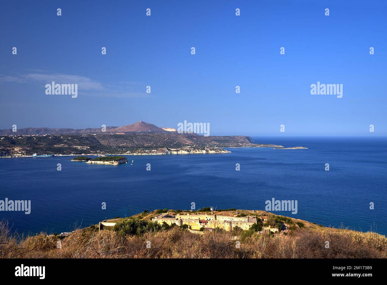 View of Souda Bay and the stone walls of the historic castle on the ...