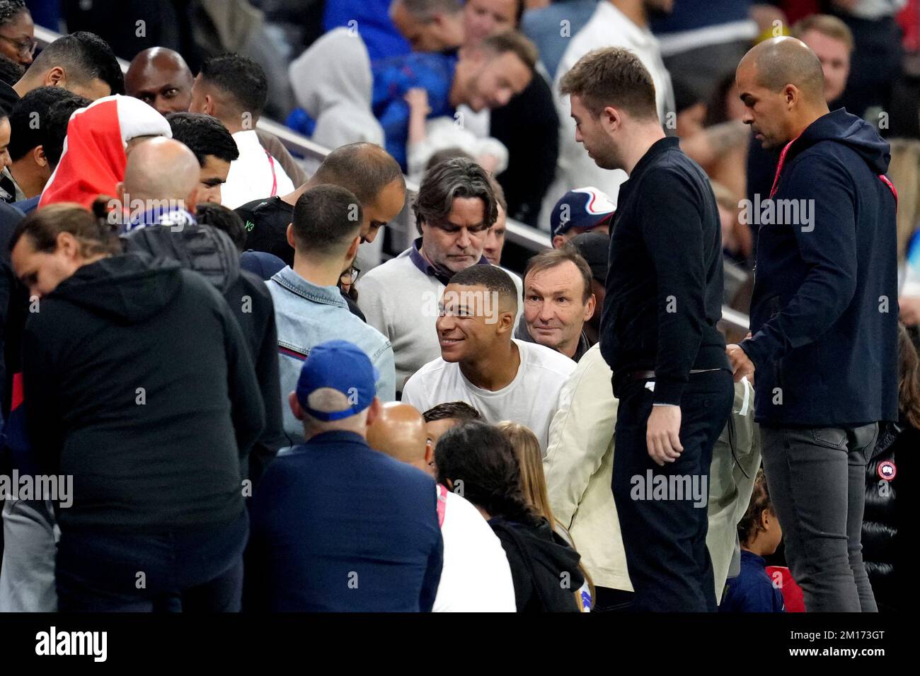 France's Kylian Mbappe celebrates after the match with friends and ...