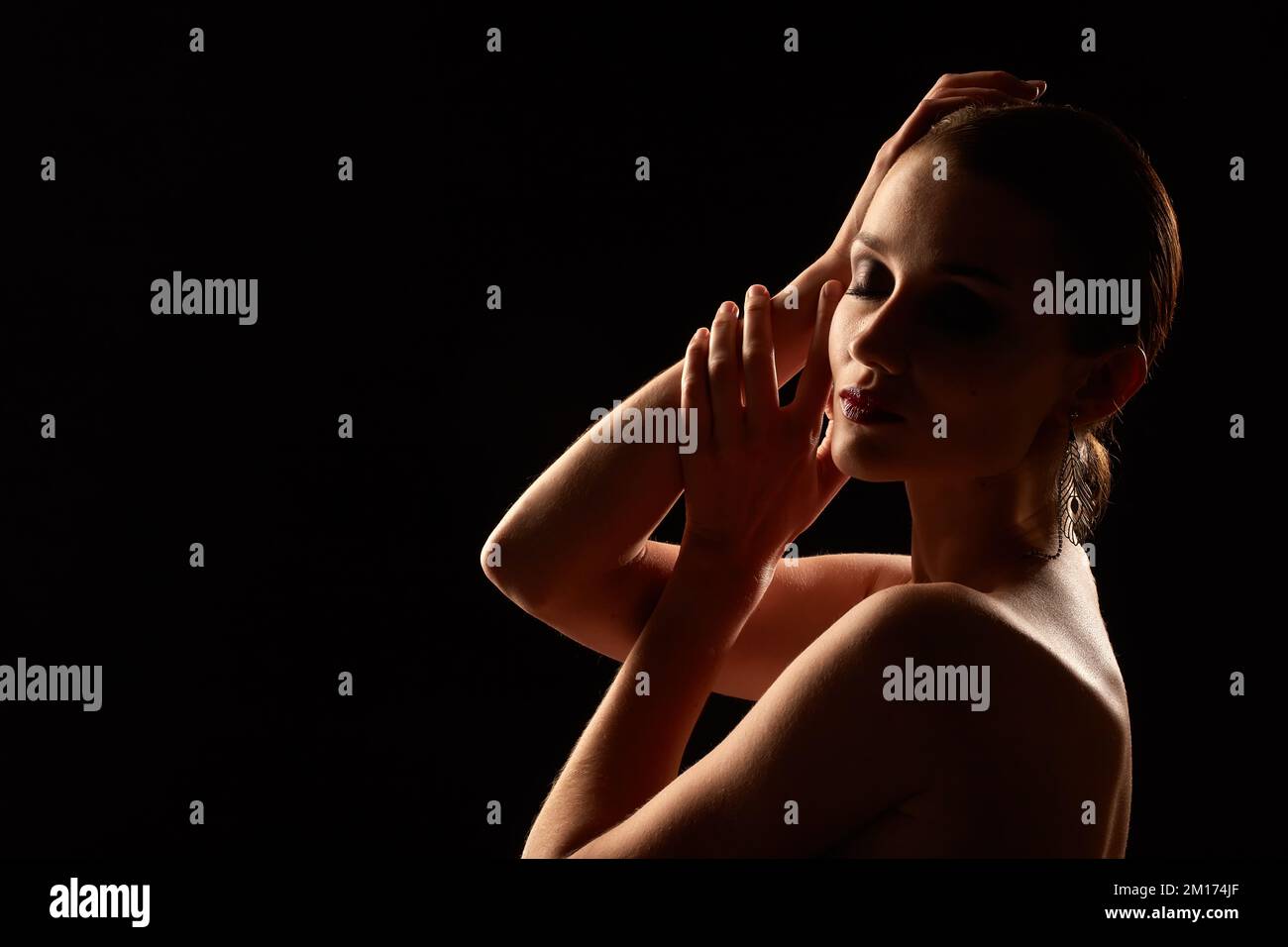 beautiful woman profile silhouette on back background with copy space ...