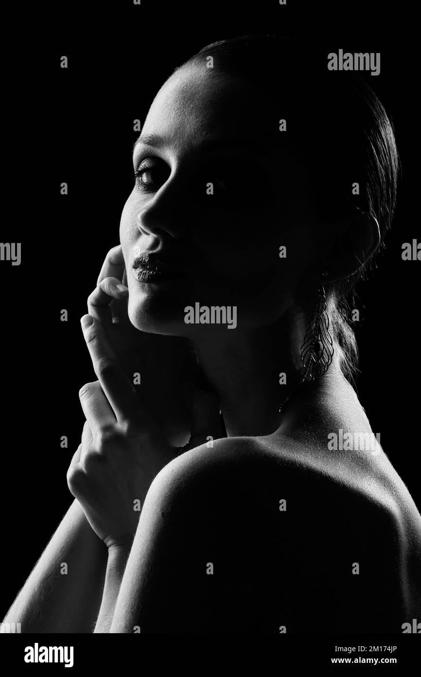 beautiful woman profile silhouette on back background with copy space ...