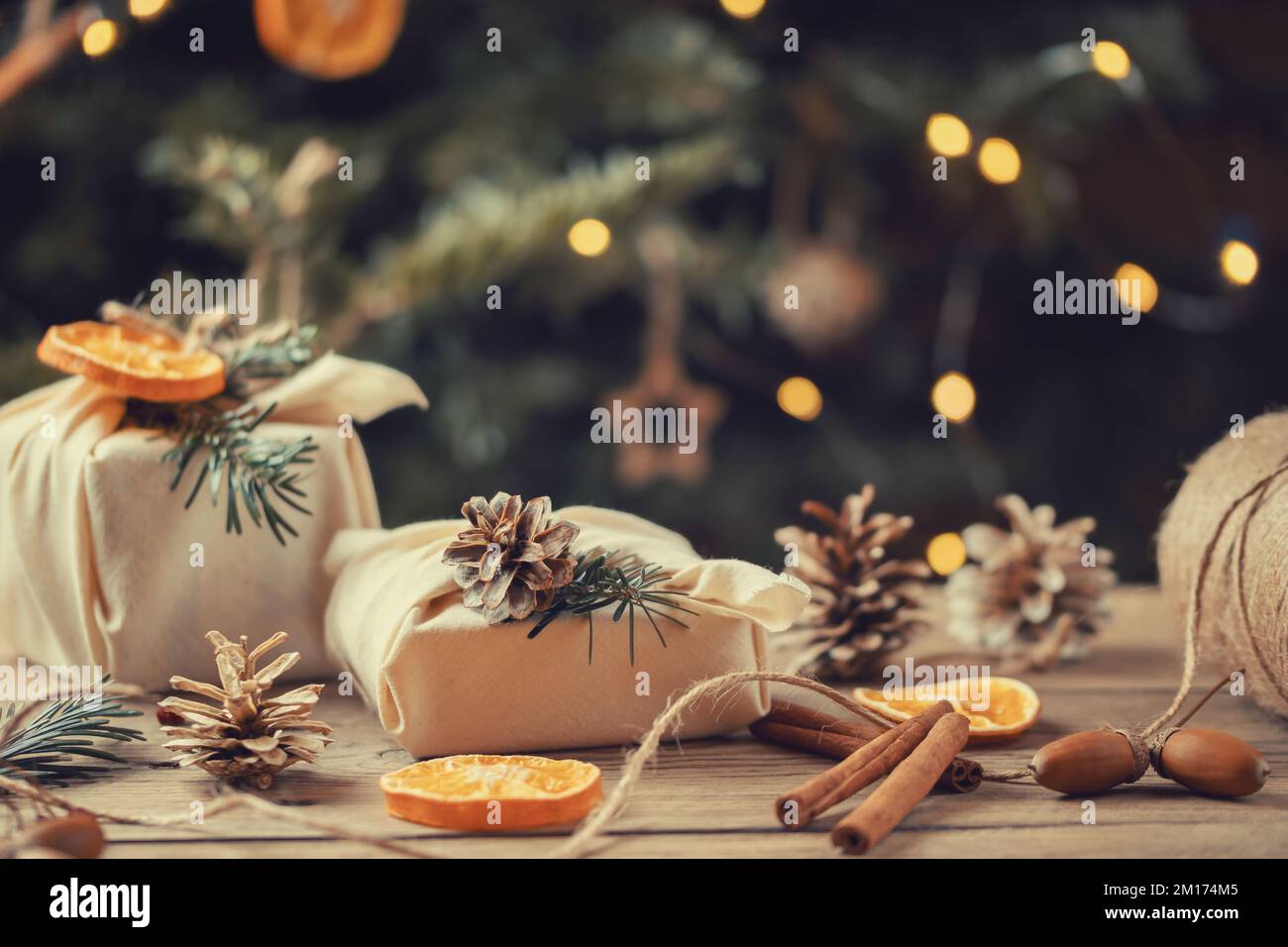 Zero waste christmas concept. Packed in natural fabric gifts and ...