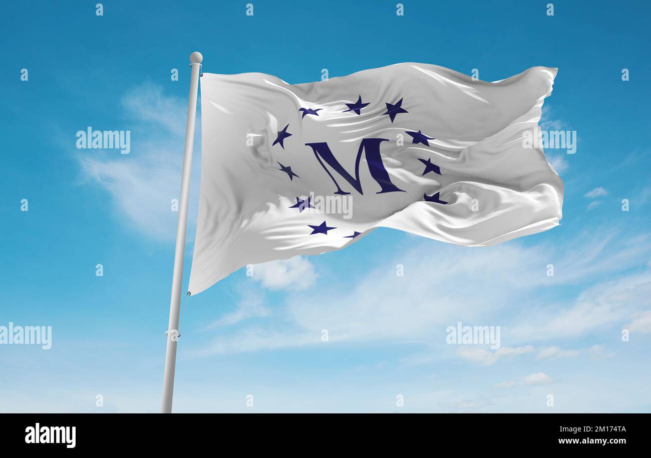 official flag of Madrid, Iowa untied states of America at cloudy sky ...