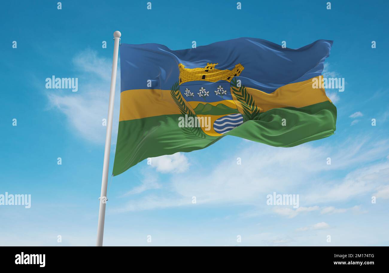 official flag of Luquillo untied states of America at cloudy sky ...