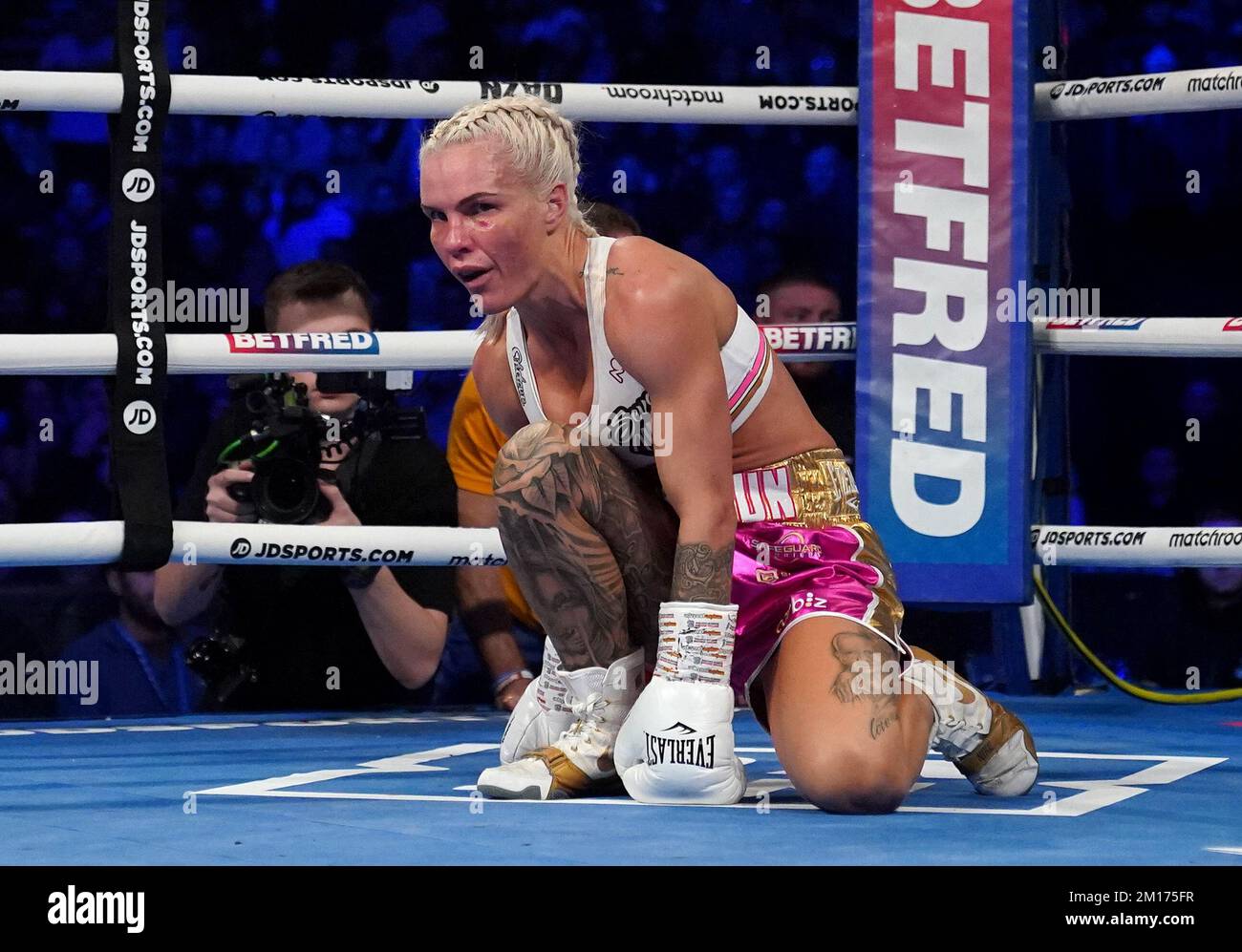 Shannon O'Connell after being knocked down by Ebanie Bridges in their ...