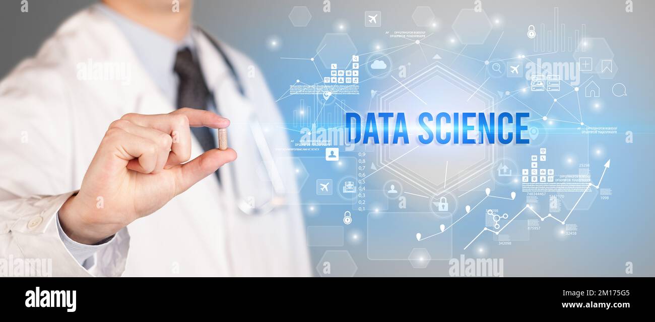 Doctor giving a pill concept Stock Photo - Alamy