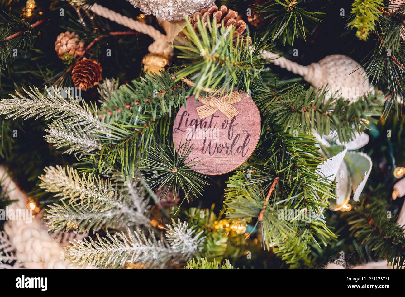 A cute wooden Christmas ornament with "light of world" writing - Jesus ...