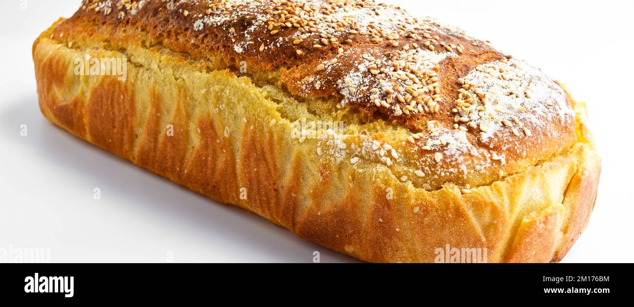 Fresh baked nutritious and golden colored bread homemade, isolated on ...