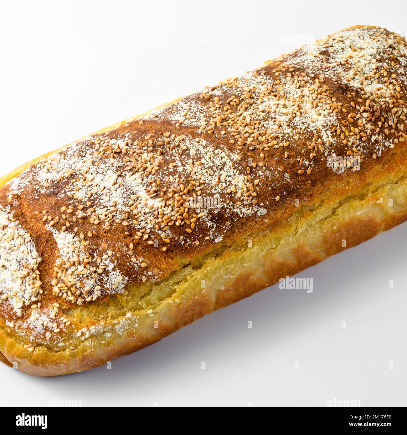 Fresh baked nutritious and golden colored bread homemade, isolated on ...