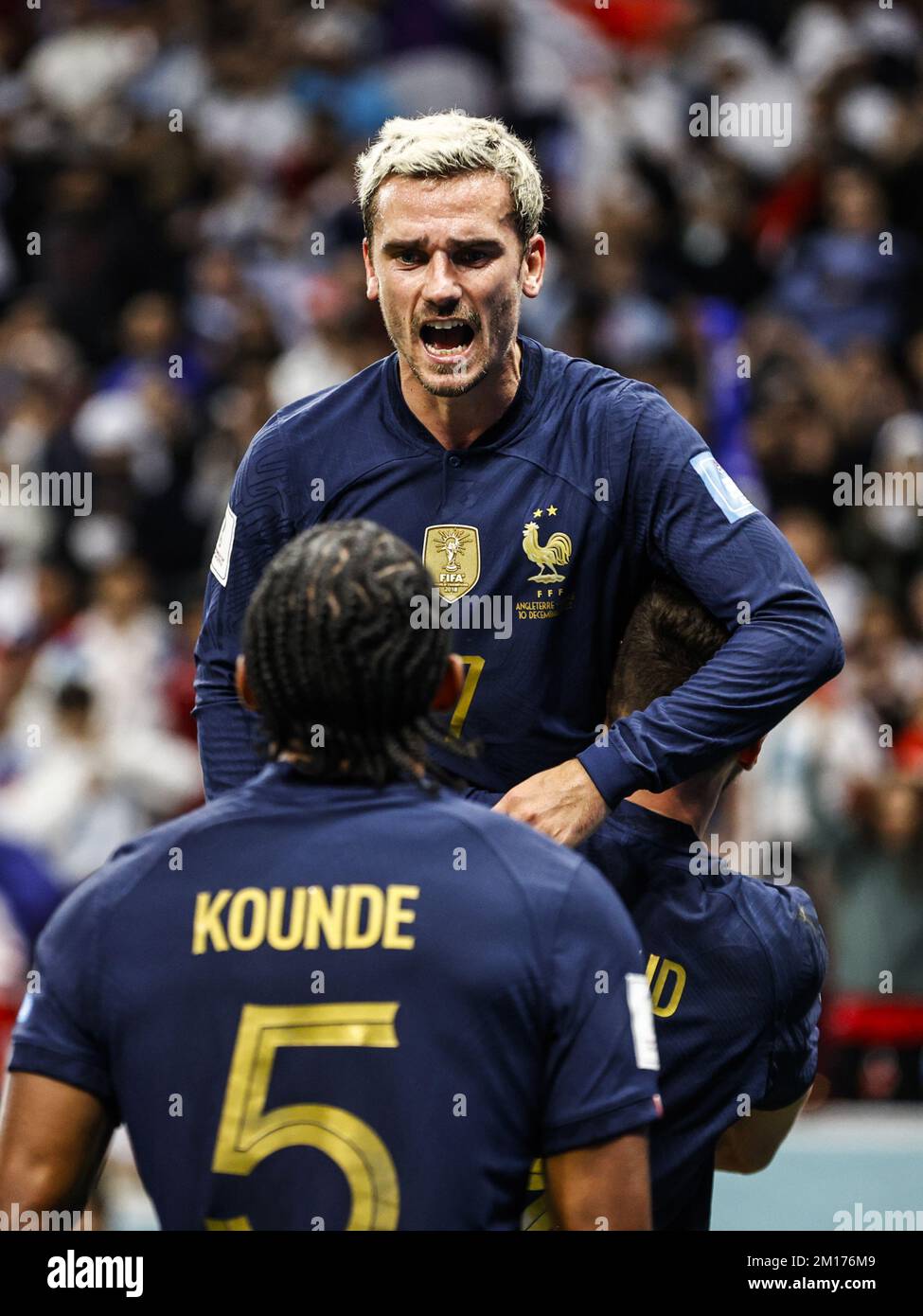 AL KHOR - (l-r) Jules Kounde of France, Antoine Griezmann of France ...