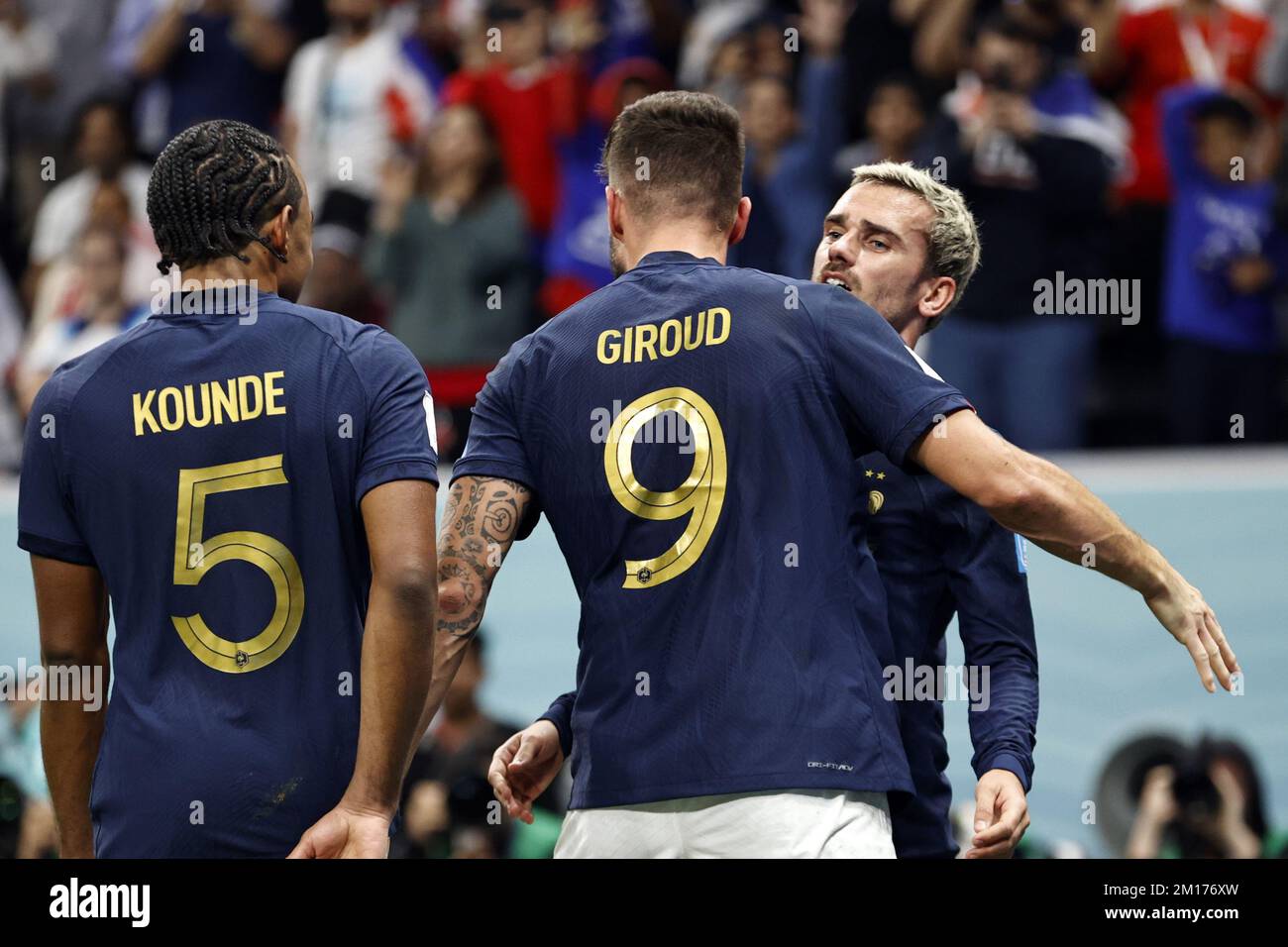 AL KHOR - (l-r) Jules Kounde of France, Antoine Griezmann of France ...