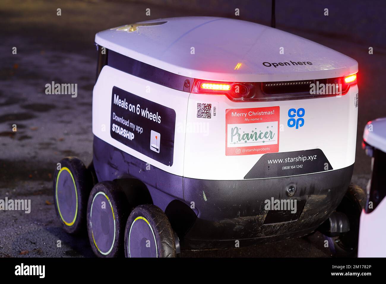 Driverless robots dressed as reindeers whilst delivering groceries to ...