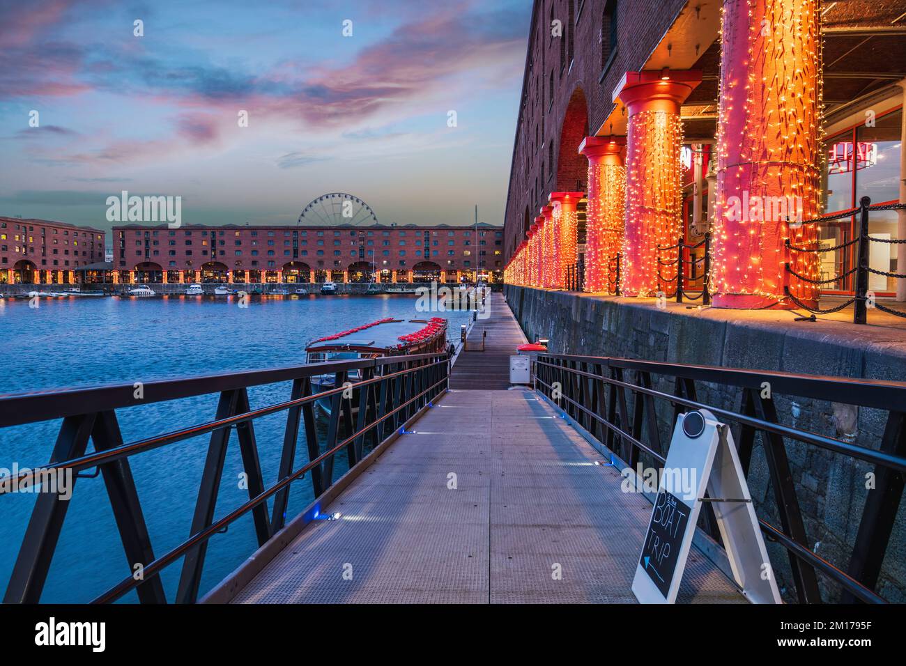 Boat trip point at Albert dock in Liverpool during sunset Stock Photo ...