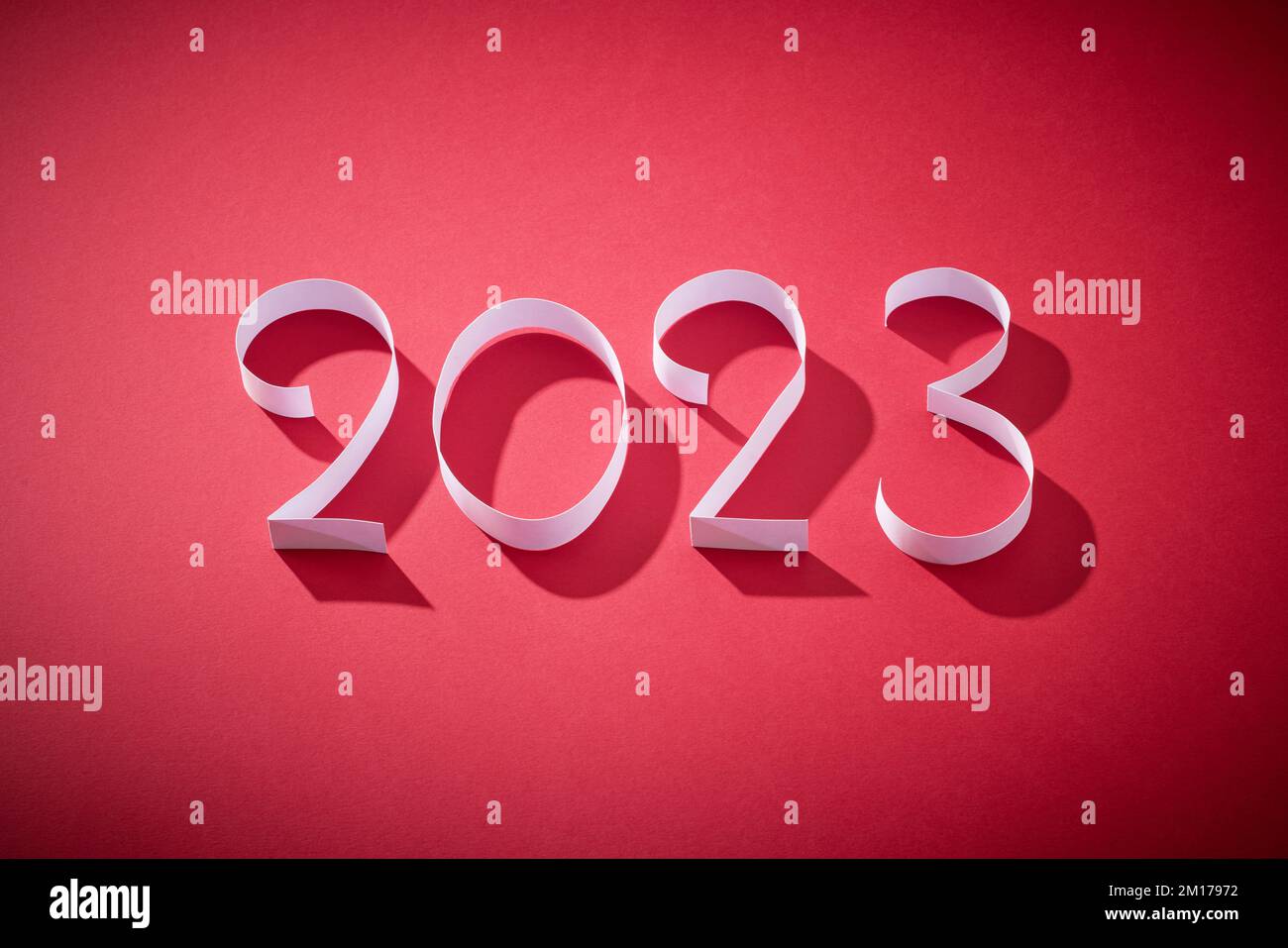 paper numbers two zero two three on red background Stock Photo - Alamy