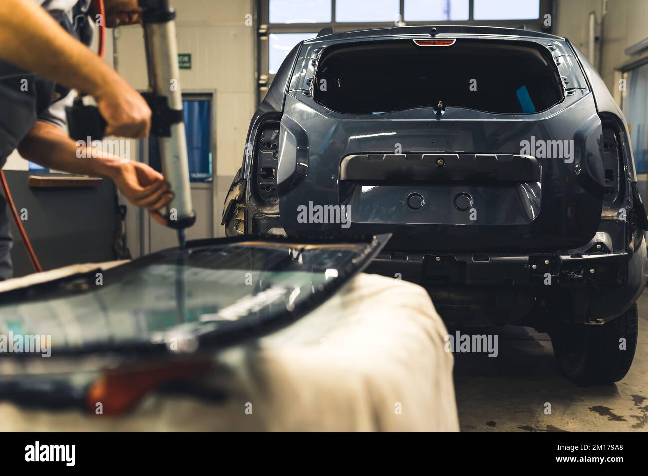 Professional caucasian car detailing worker hi-res stock photography ...