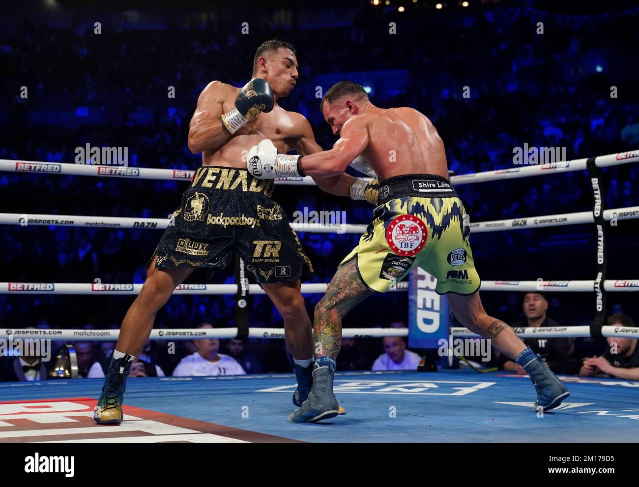 Luis Alberto Lopez (left) and Josh Warrington in action in their IBF ...