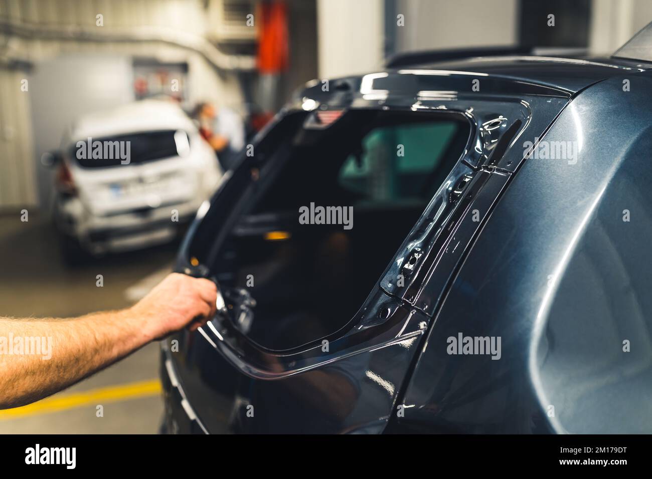 Car inside a garage hi-res stock photography and images - Alamy