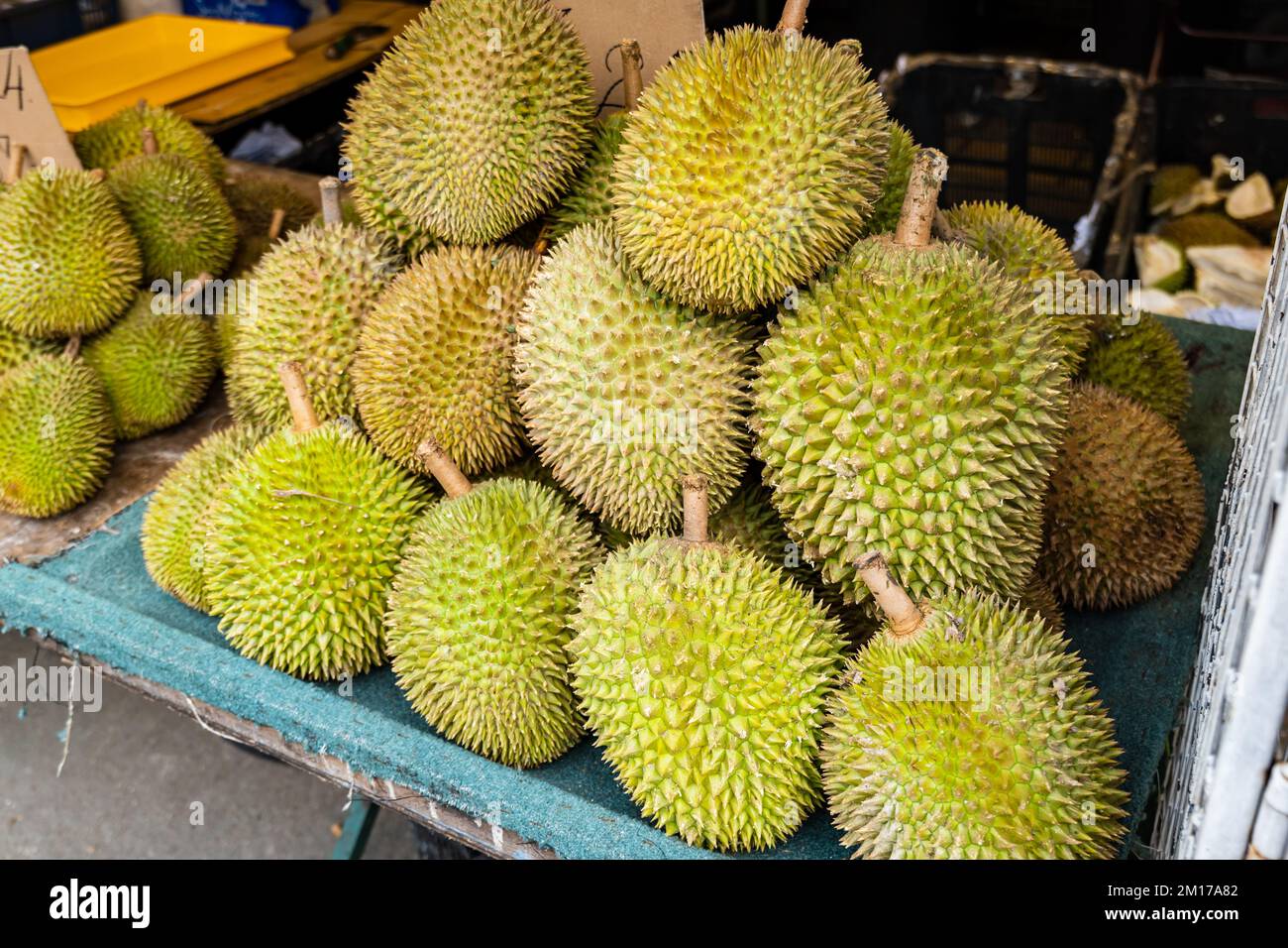 Durian fruit in fruit market in Asia. The durian is the edible fruit of ...