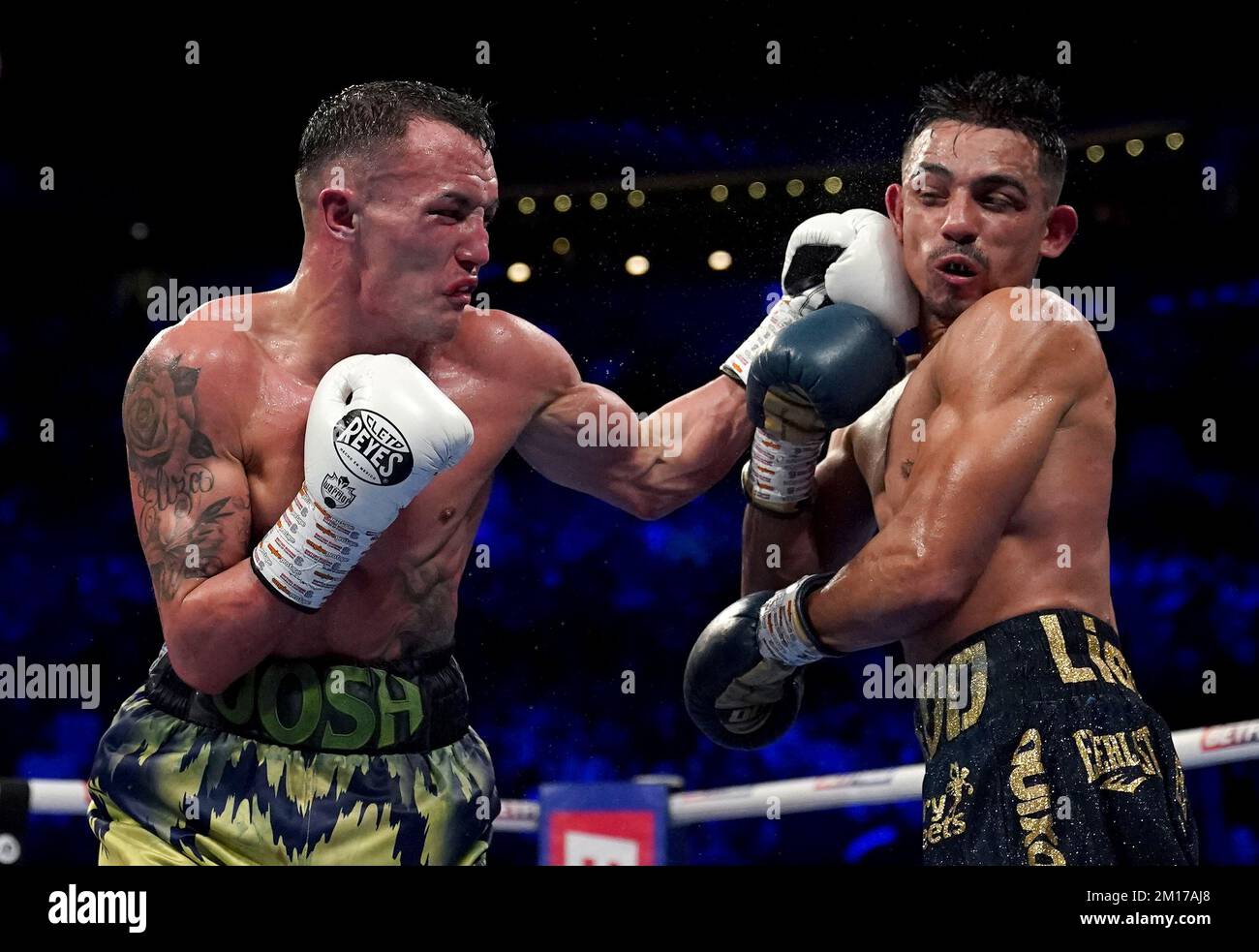 Josh Warrington (left) and Luis Alberto Lopez in action in their IBF ...