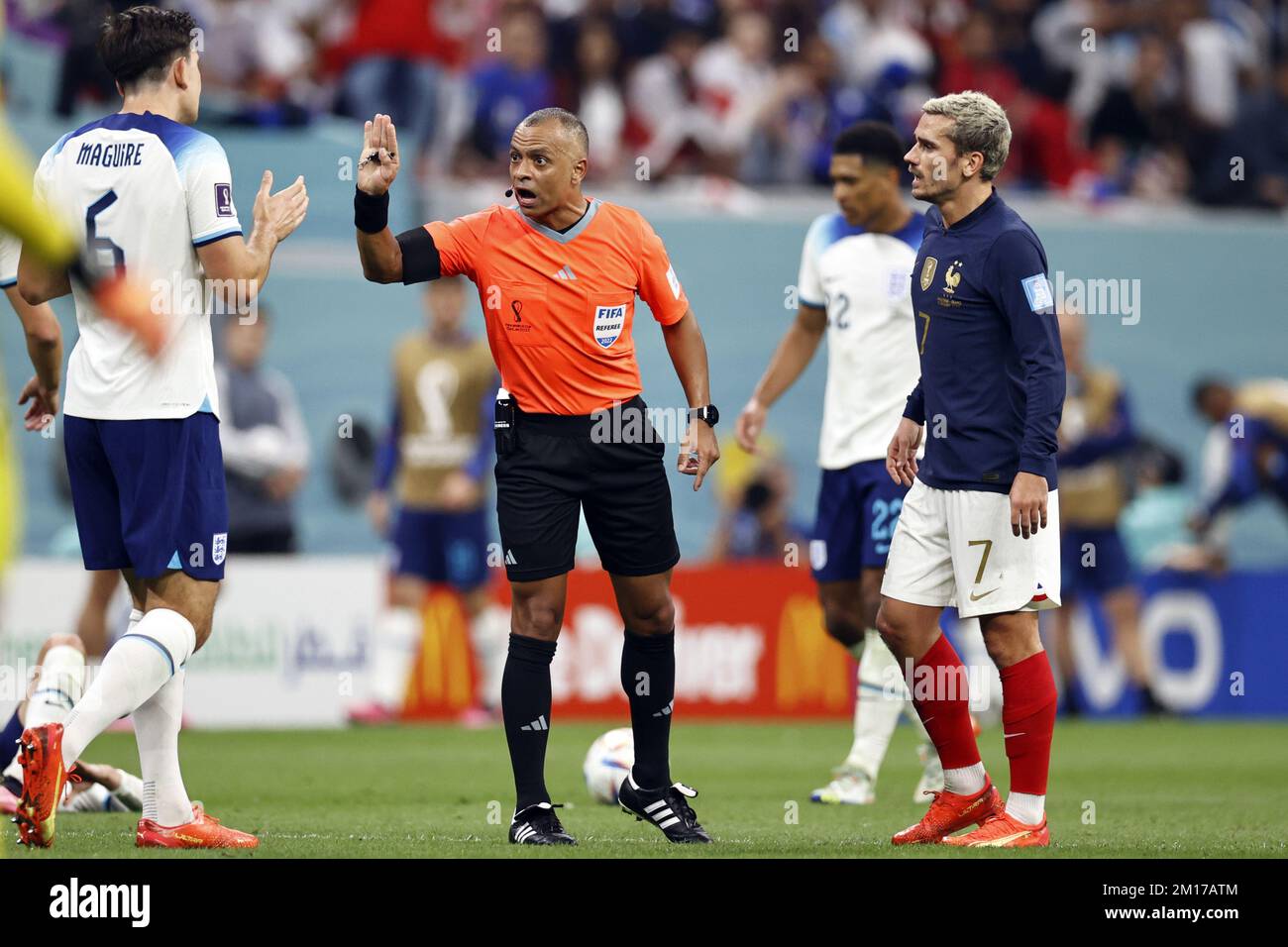 AL KHOR - (l-r) Harry Maguire of England, referee Wilton Sampaio ...