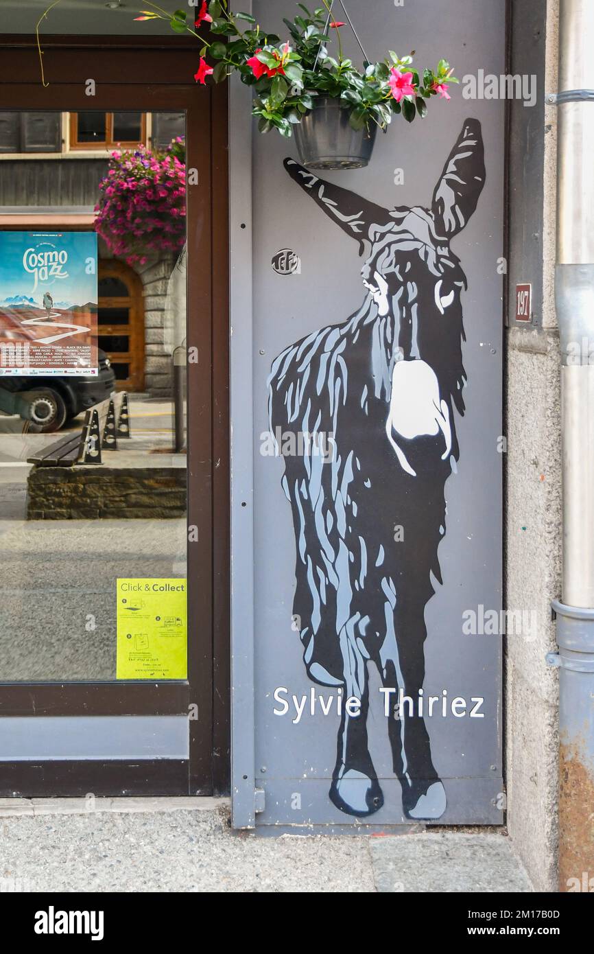 Entrance of a household linen shop decorated with a mural depicting a ...
