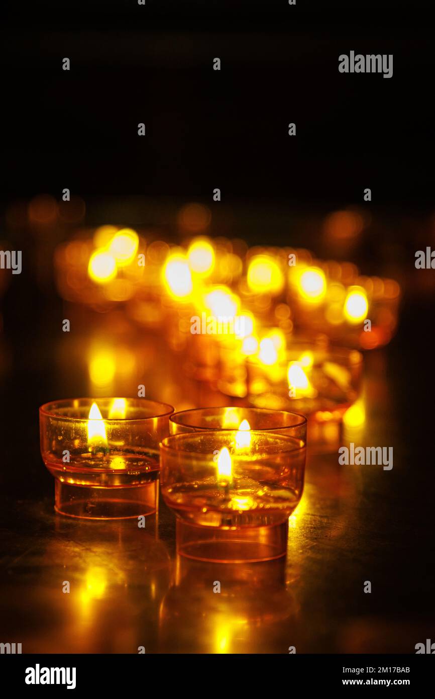 Burning glass candles with shallow depth of field Stock Photo - Alamy