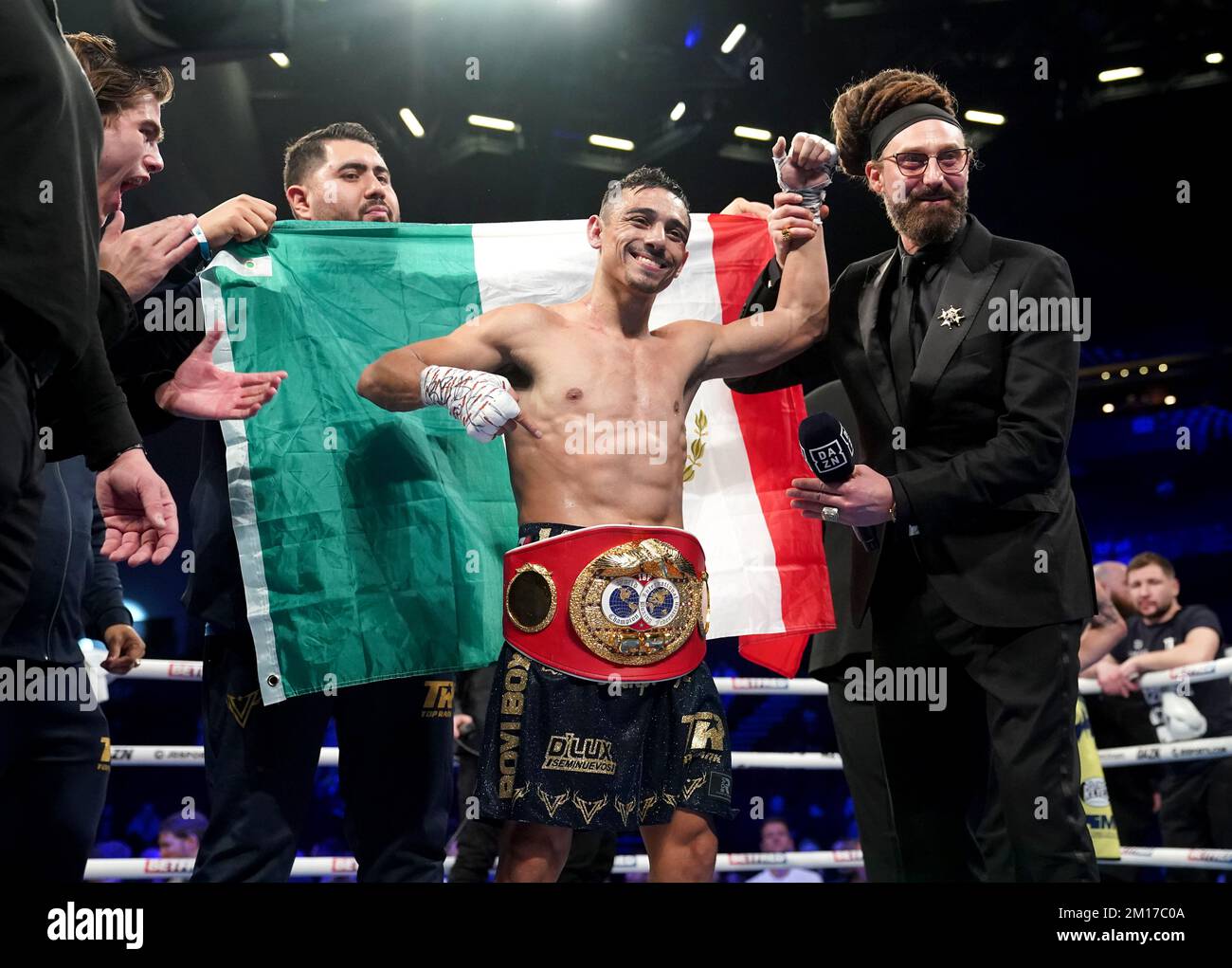 Luis Alberto Lopez celebrates victory over Josh Warrington after their ...