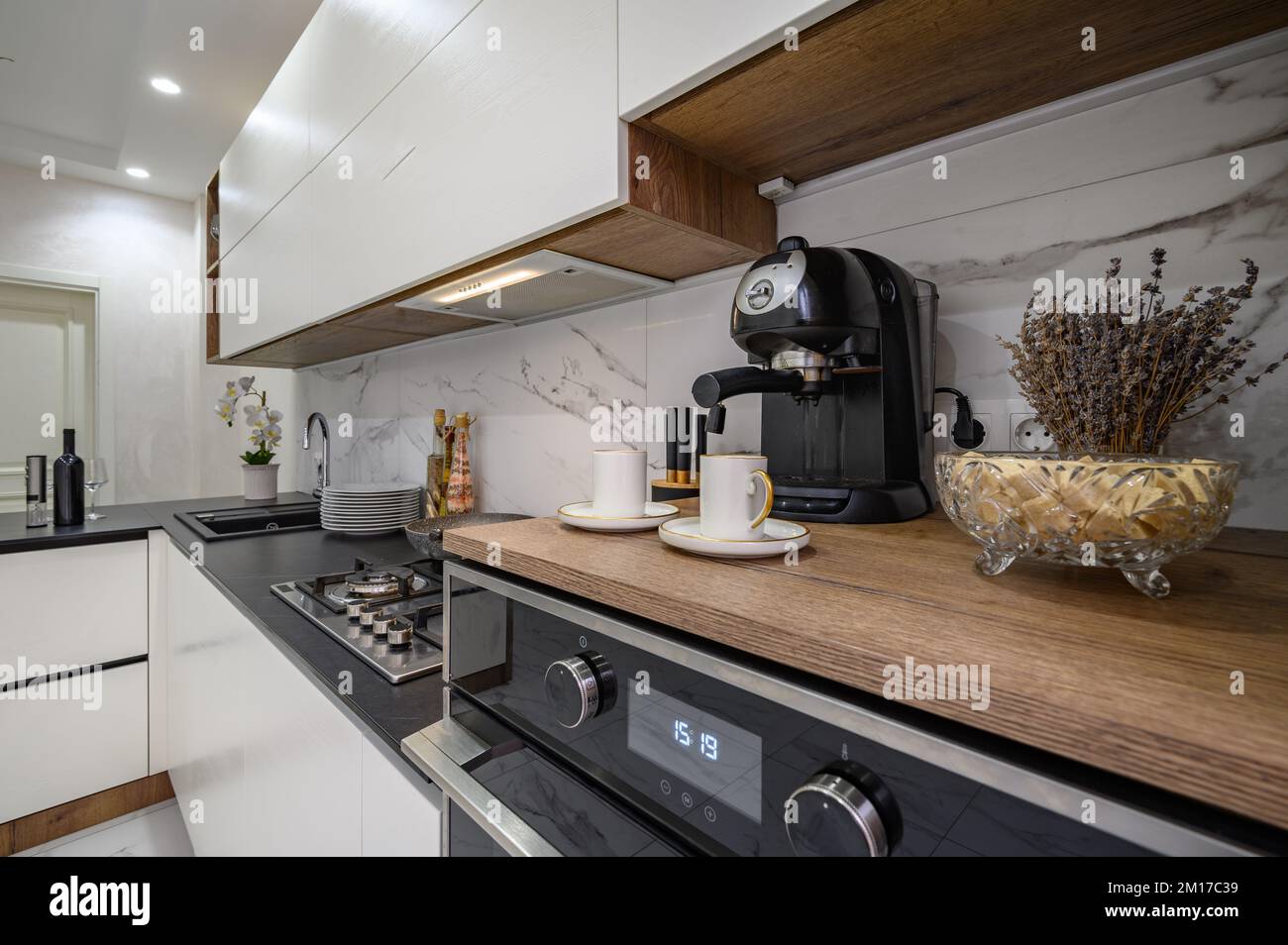White and black modern luxury kitchen details Stock Photo - Alamy