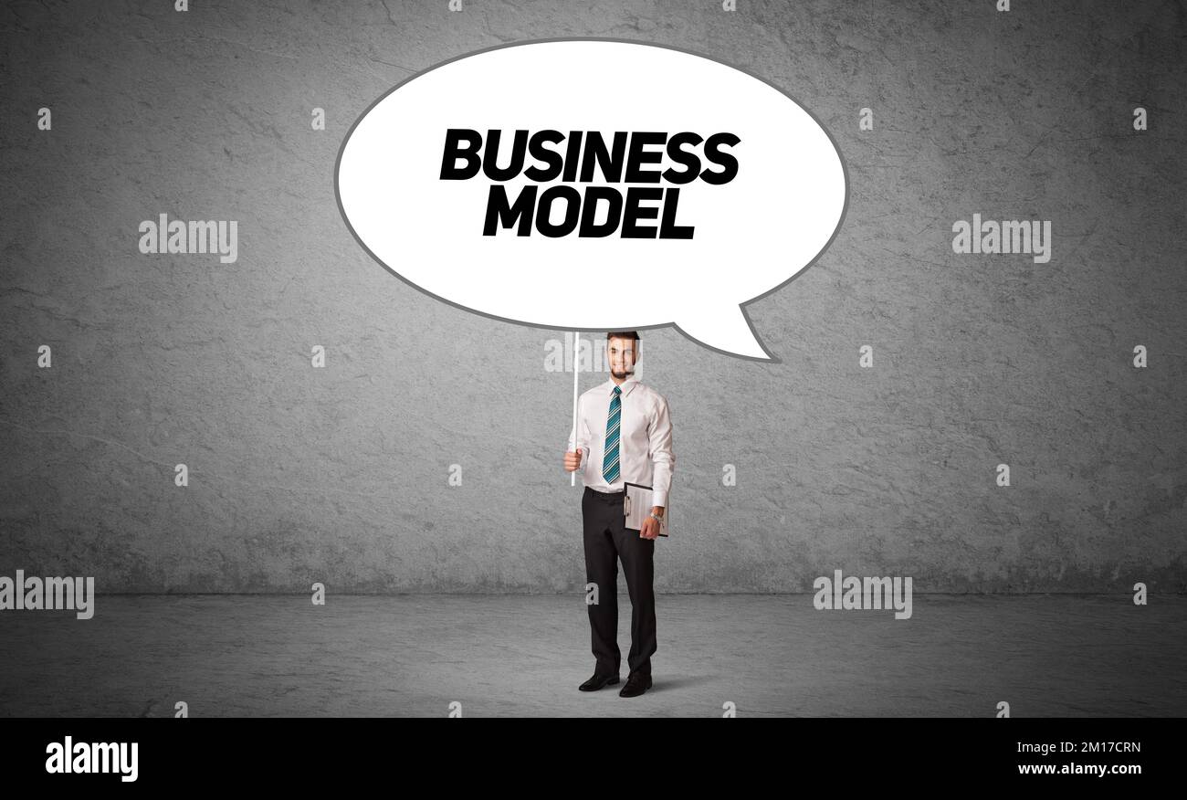 business person in casual holding road sign Stock Photo - Alamy