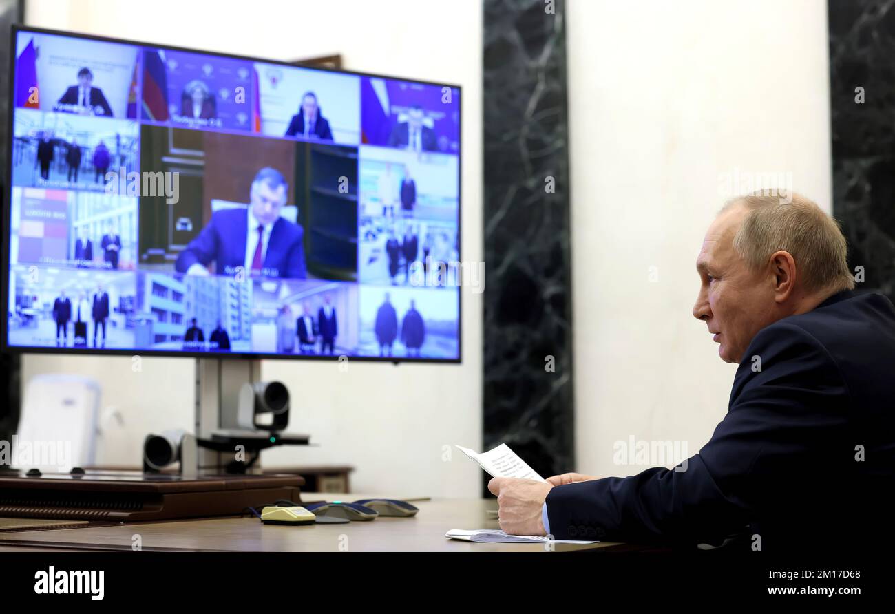Russian President Vladimir Putin conducts a teleconference from his ...