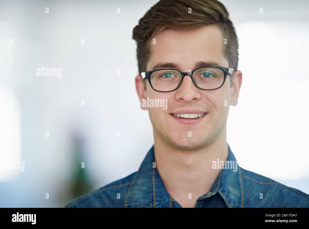 Hes got a strong work ethic. Portrait of a handsome young office worker ...