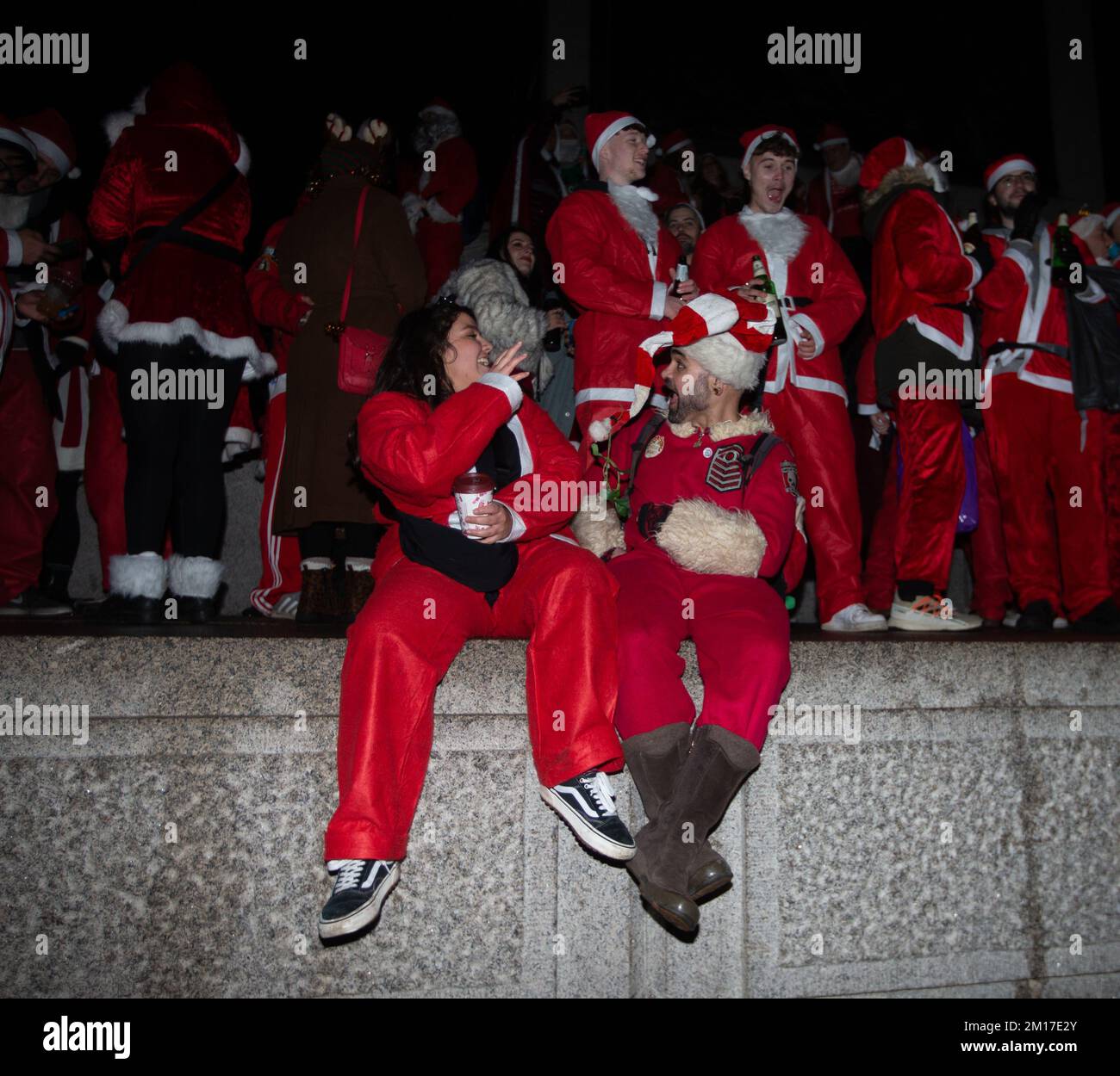 London, England, UK. 10th Dec, 2022. Revellers dressed as Santa are ...