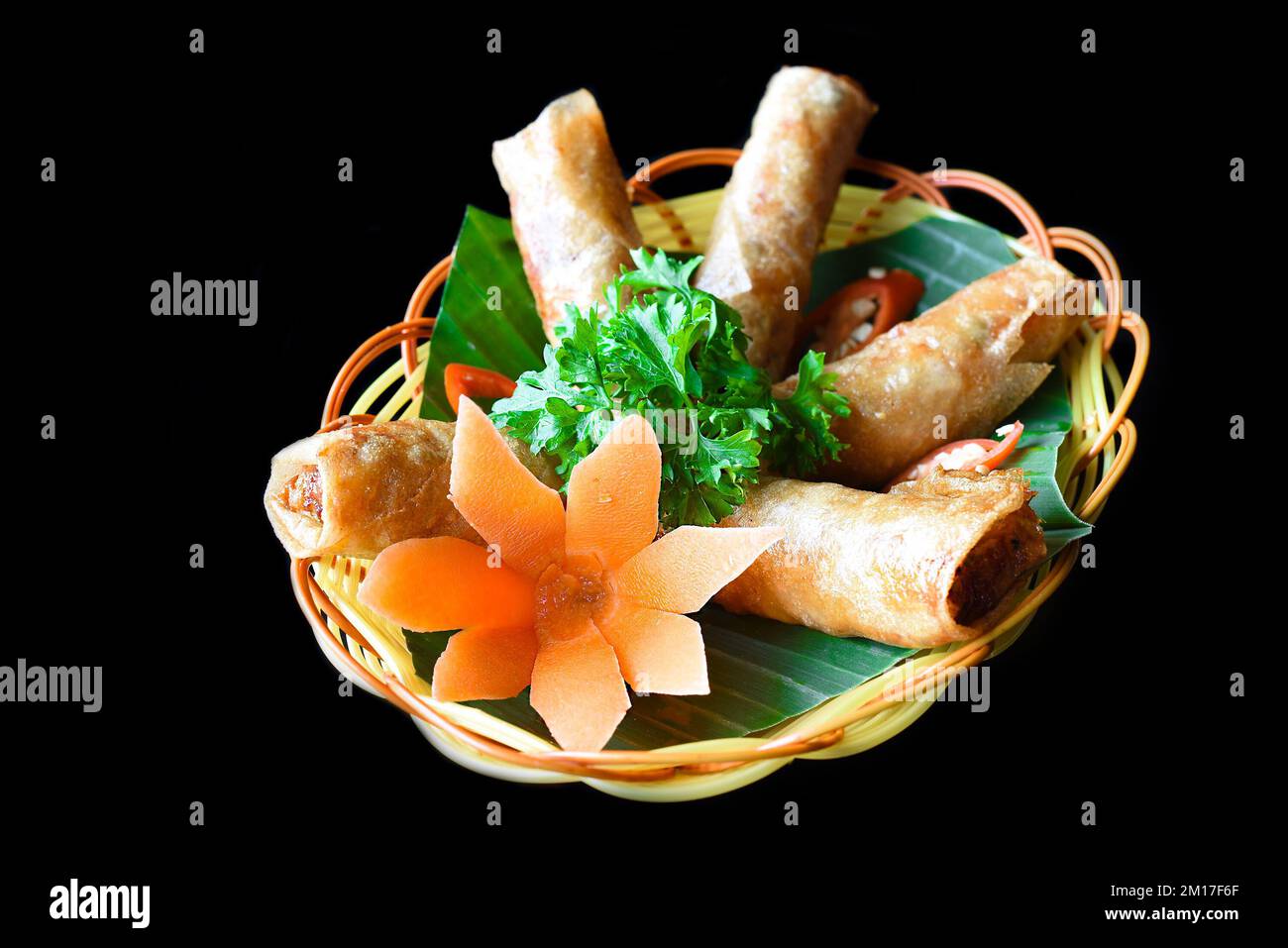 Traditional fried vietnamese spring rolls with pork, rice paper on ...
