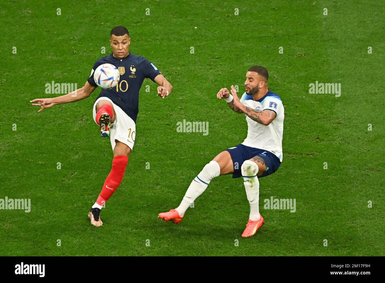 Kylian Mbappe of France and Kyle Walker of England during England v ...