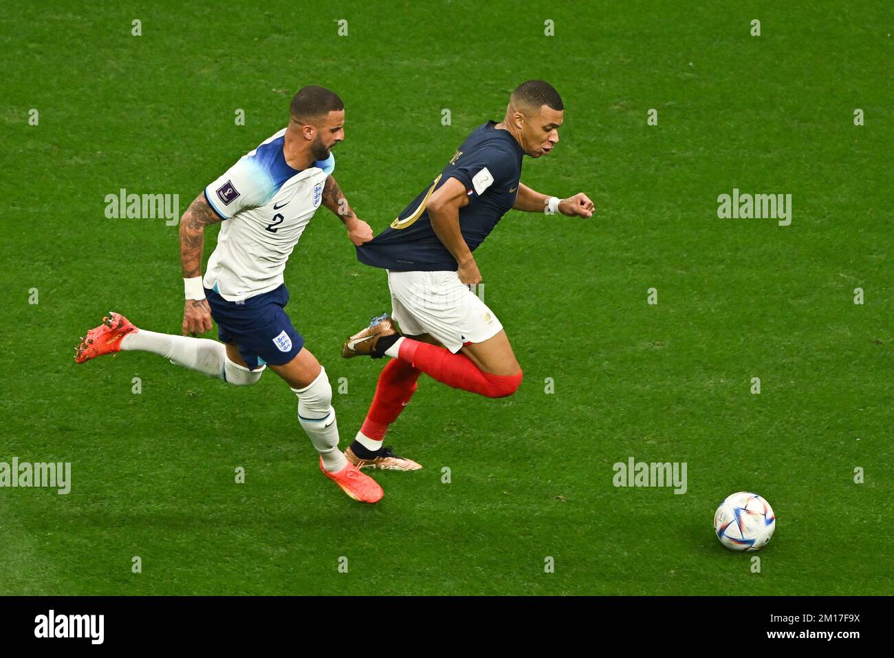Kylian Mbappe of France and Kyle Walker of England during England v ...