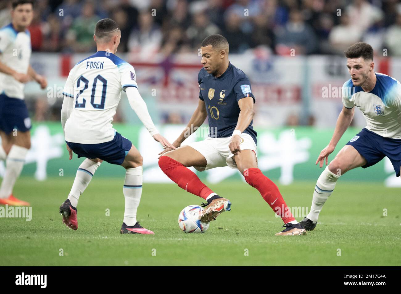 Kylian Mbappe of France and Phil Foden of England in action during the ...