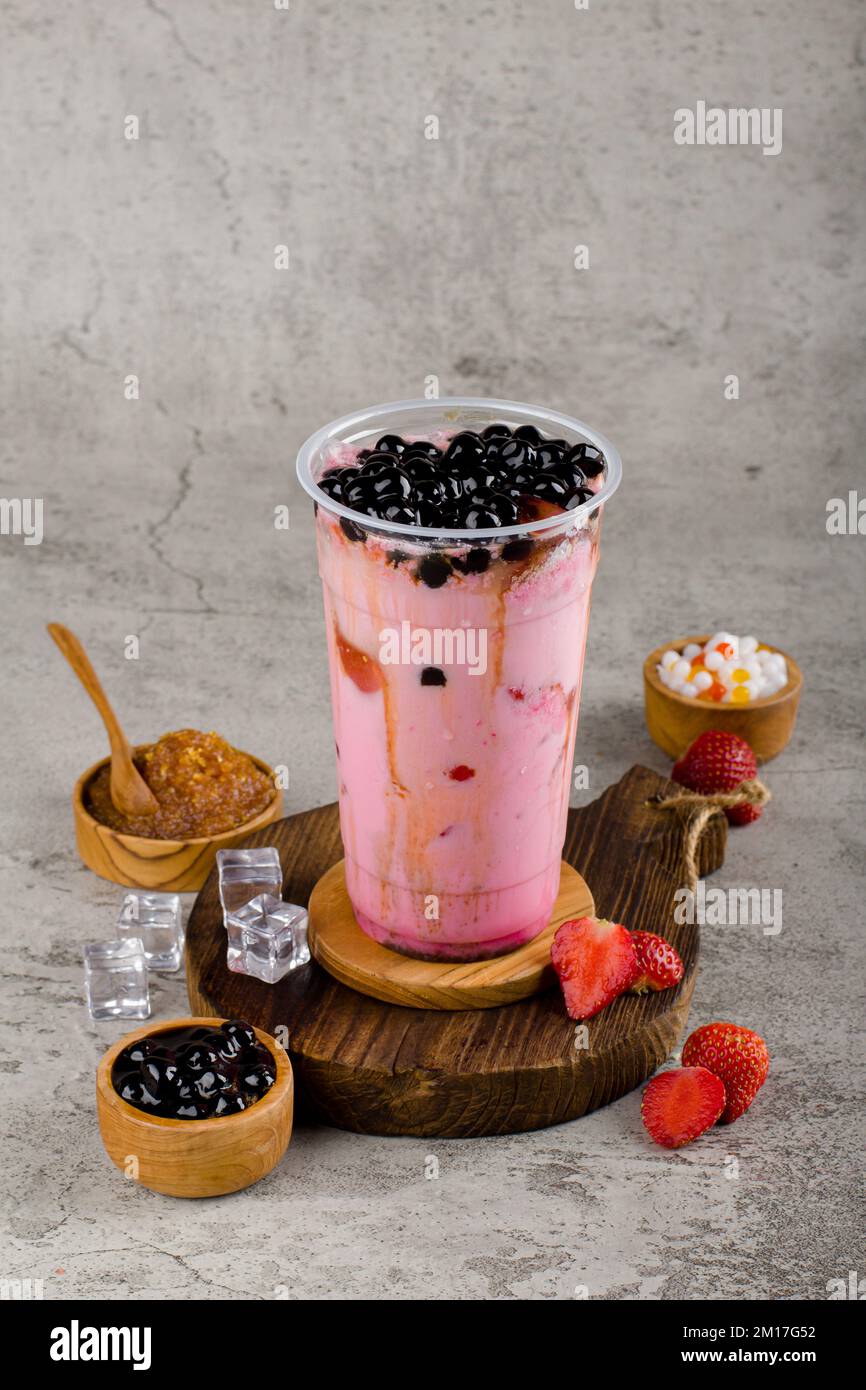 Boba or tapioca pearls is taiwan bubble milk tea in plastic cup with ...