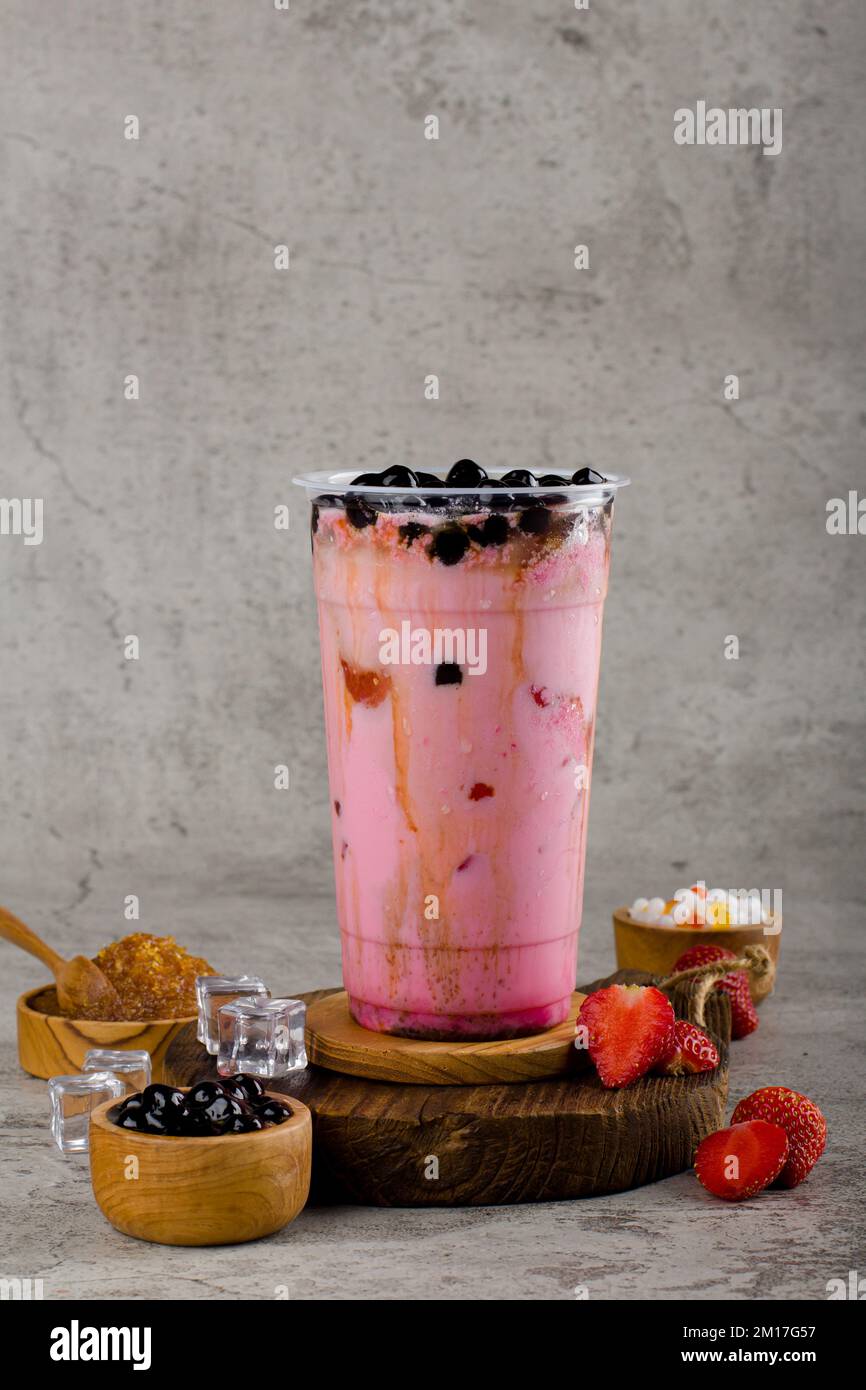 Boba or tapioca pearls is taiwan bubble milk tea in plastic cup with ...