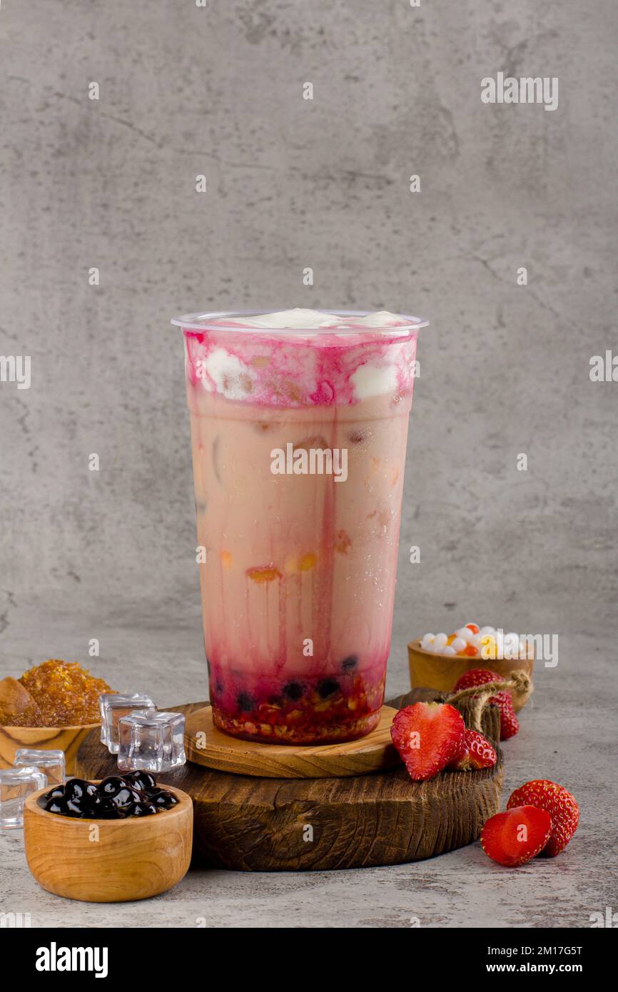 Boba or tapioca pearls is taiwan bubble milk tea in plastic cup with ...