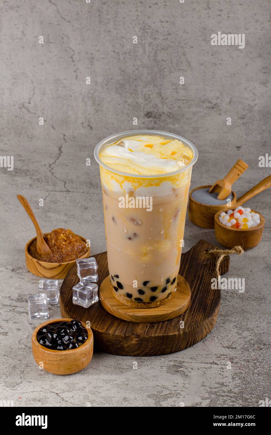 Boba or tapioca pearls is taiwan bubble milk tea in plastic cup with ...