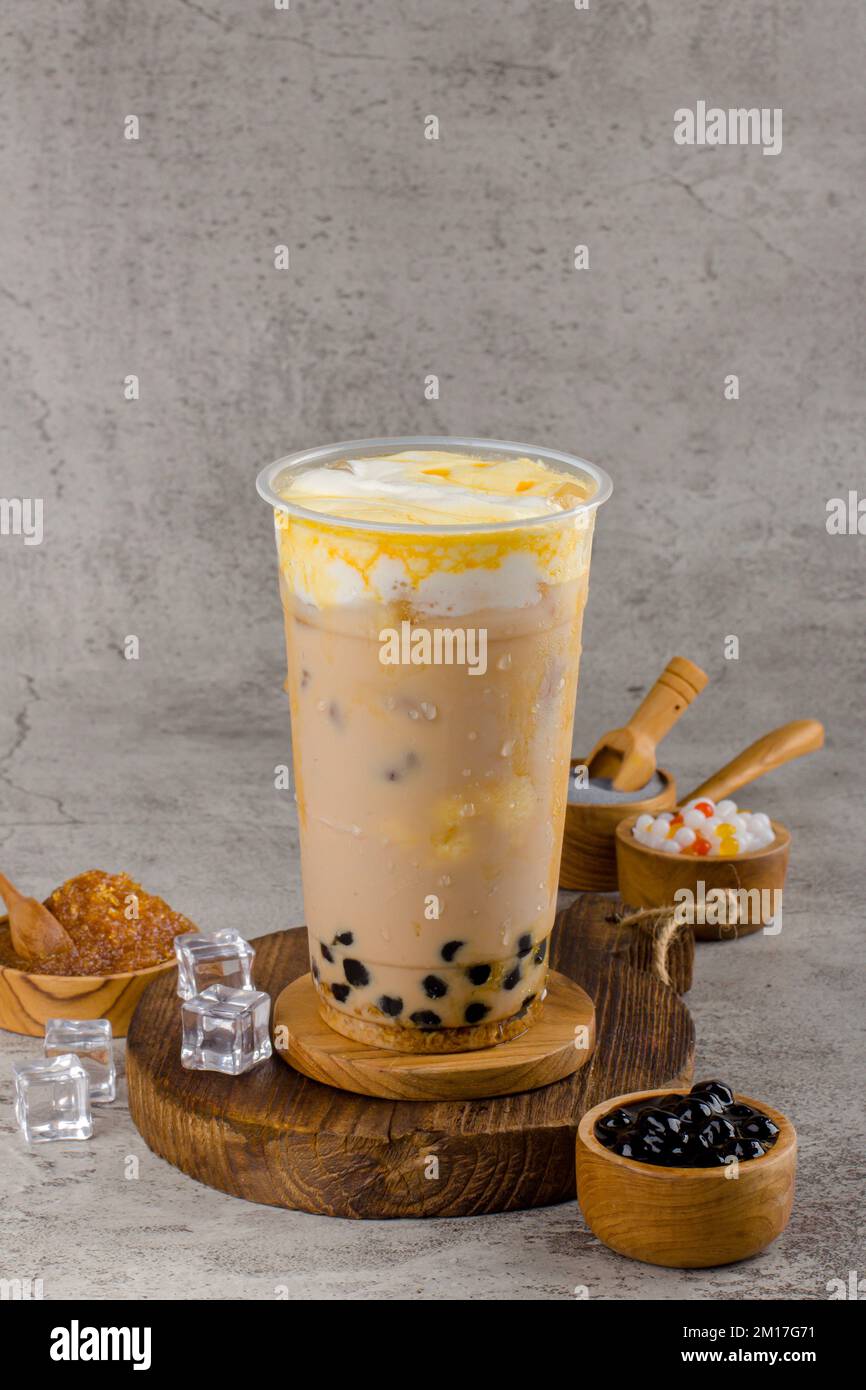 Boba or tapioca pearls is taiwan bubble milk tea in plastic cup with ...