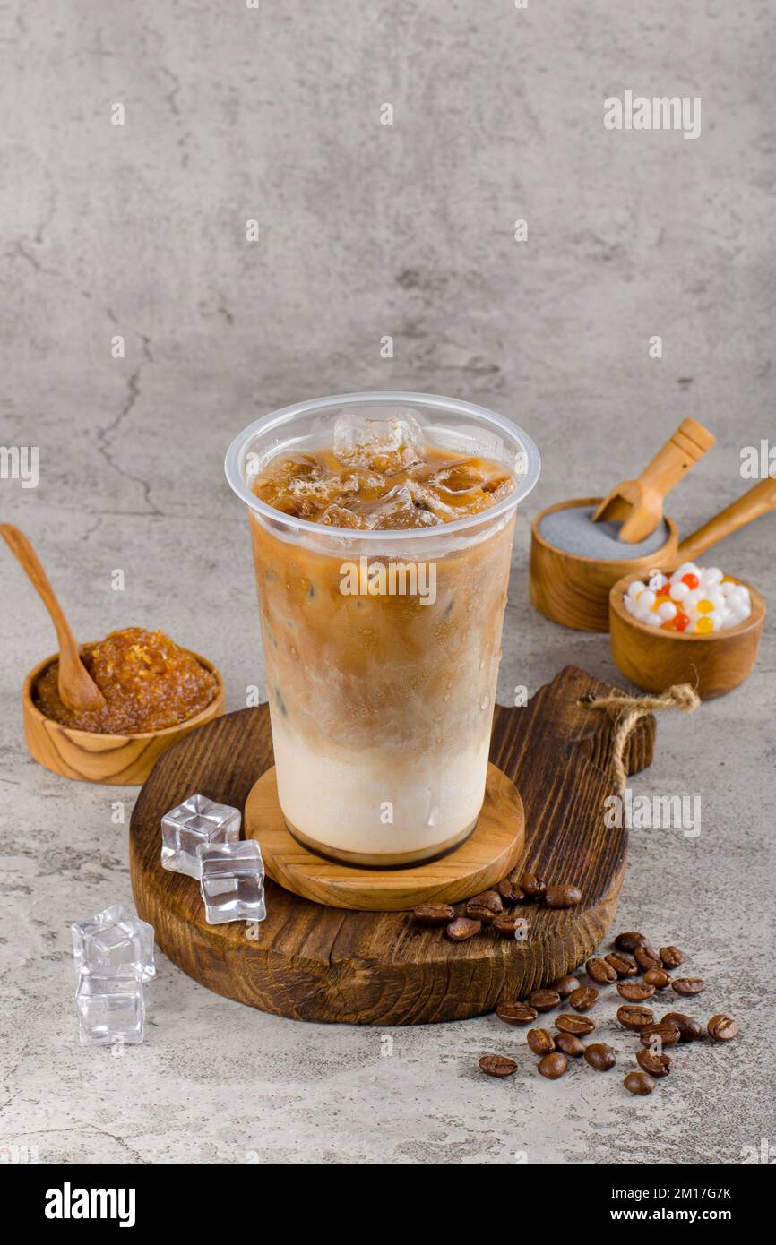Boba or tapioca pearls is taiwan bubble milk tea in plastic cup with ...