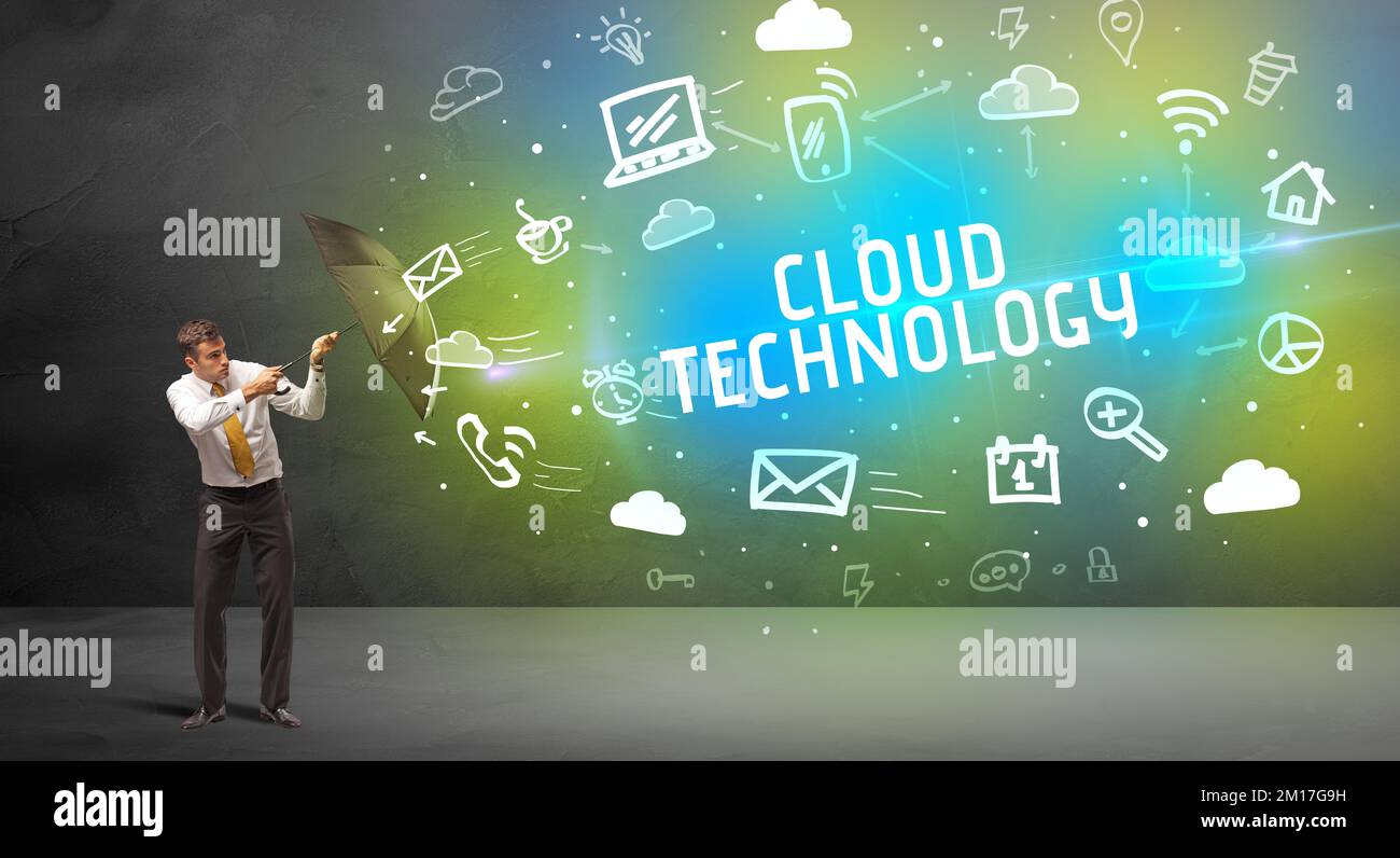 Businessman defending with umbrella, modern technology concept Stock ...